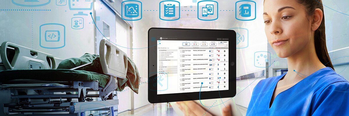 health professional using a tablet in hospital setting